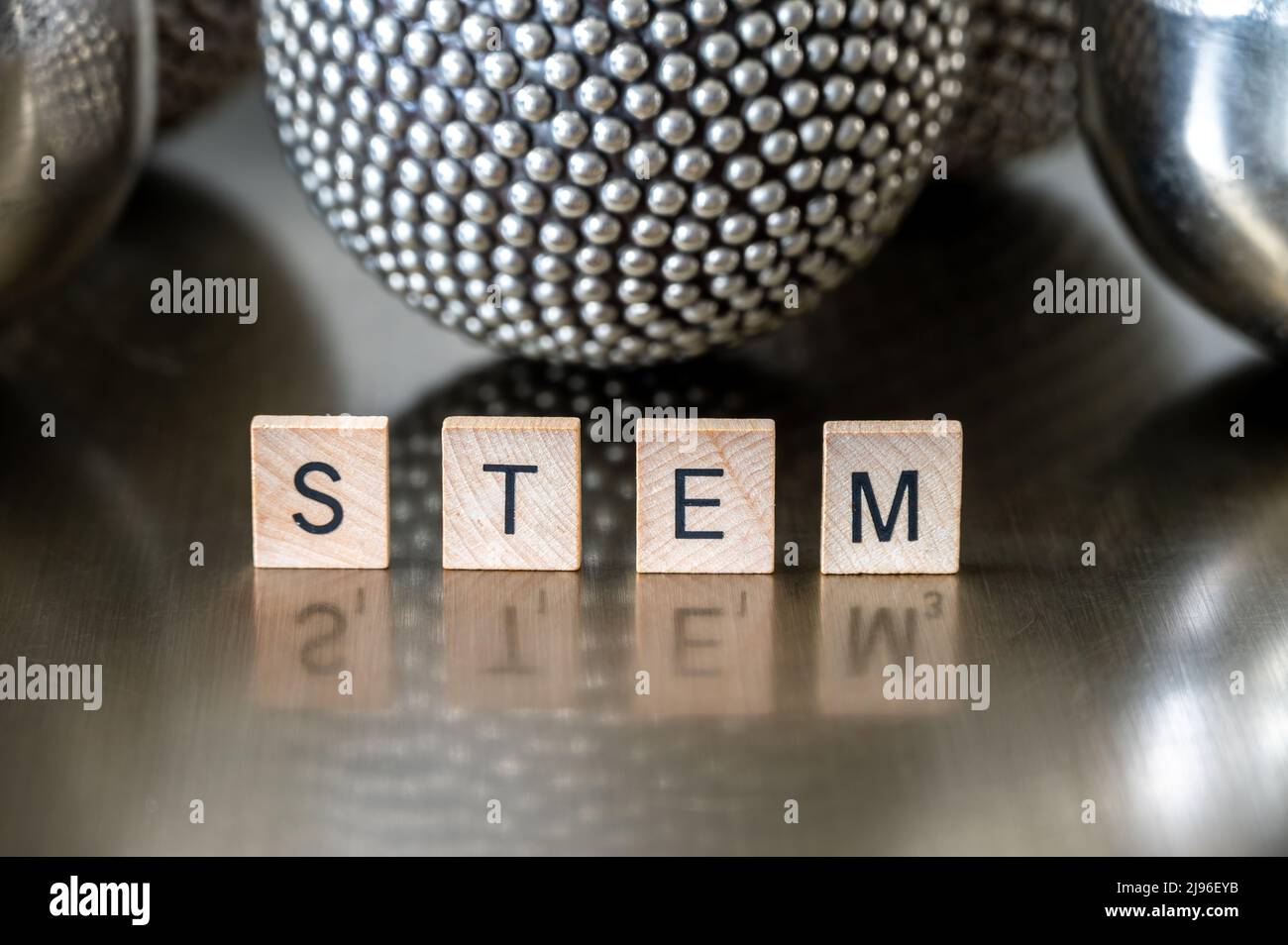 STEM - Science, Technology, Education and Math concept with tile ...