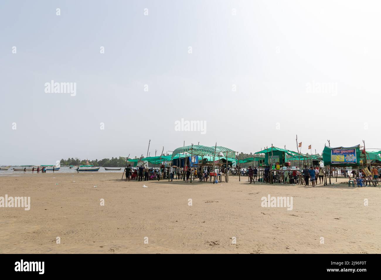 Makeshift stalls setup on Tsunami Island in the middle of Karli River ...