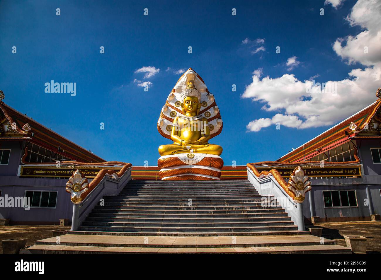 Giant Buddhawith Naga serpent temple in Singburi, Thailand Stock Photo ...