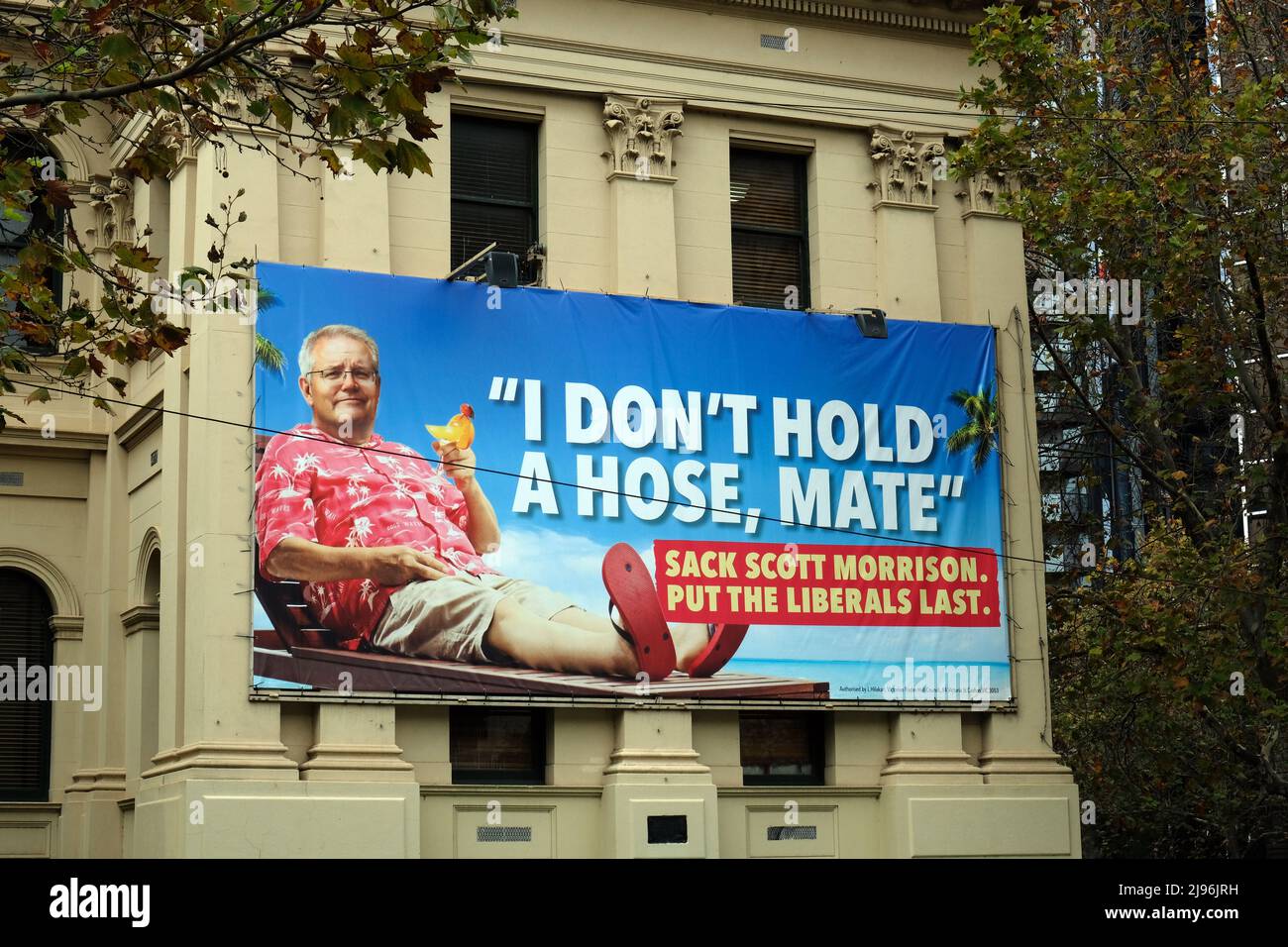 A Banner Mocking The Australian Prime Minister Scott Morrison Hangs On
