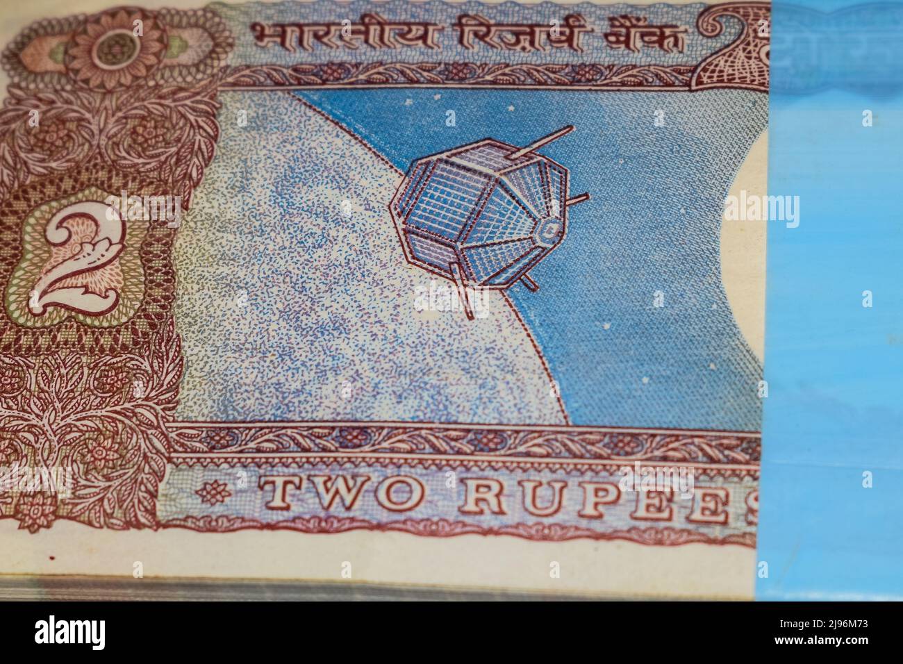 Old Two Rupee notes combined on the table, India money on the rotating ...