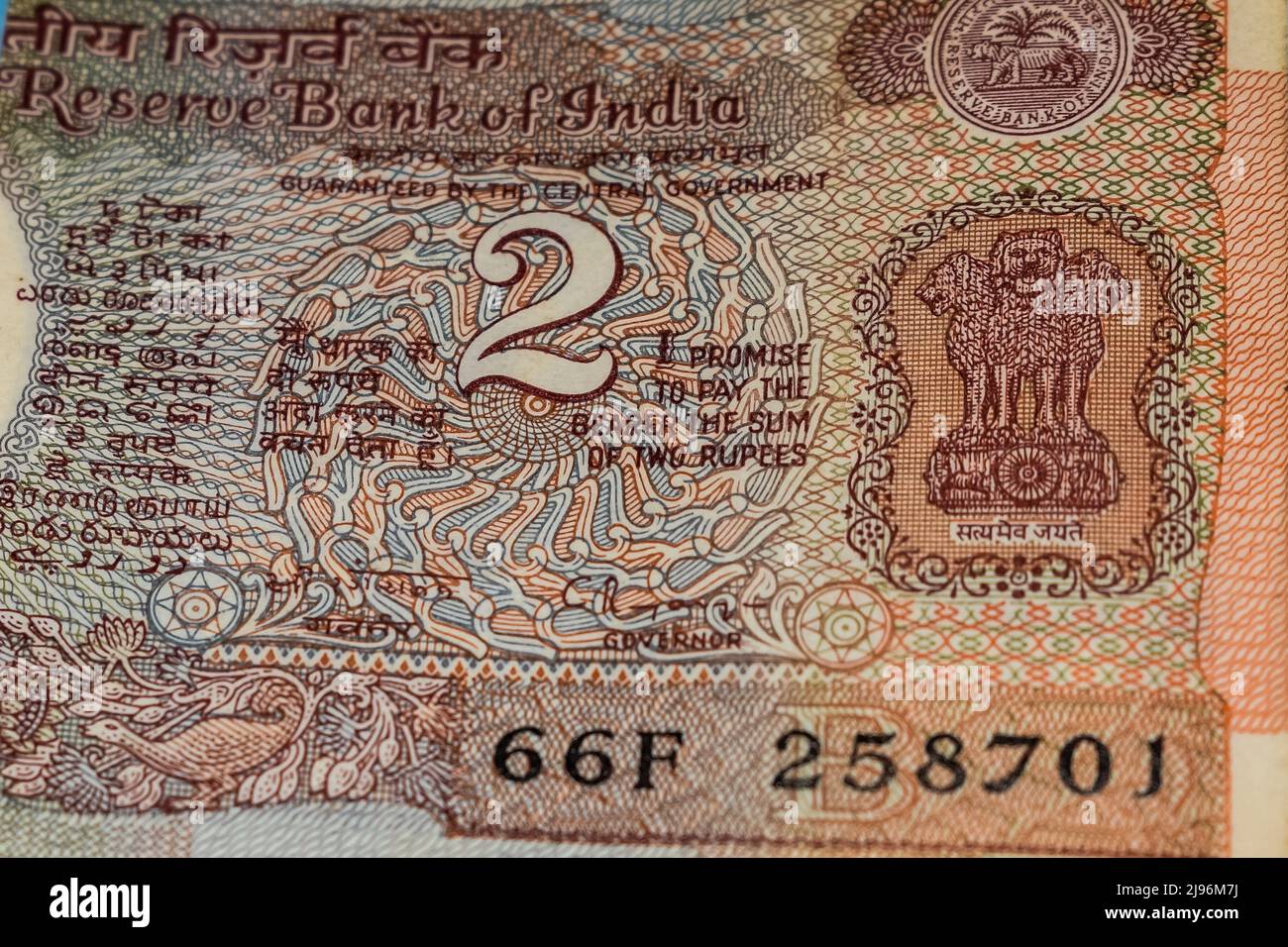 Old Two Rupee notes combined on the table, India money on the rotating ...