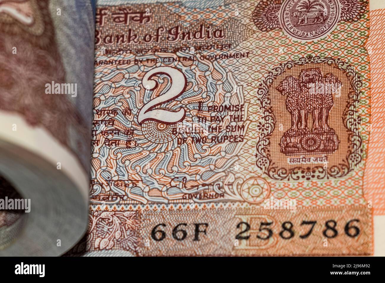 Old Two Rupee notes combined on the table, India money on the rotating ...