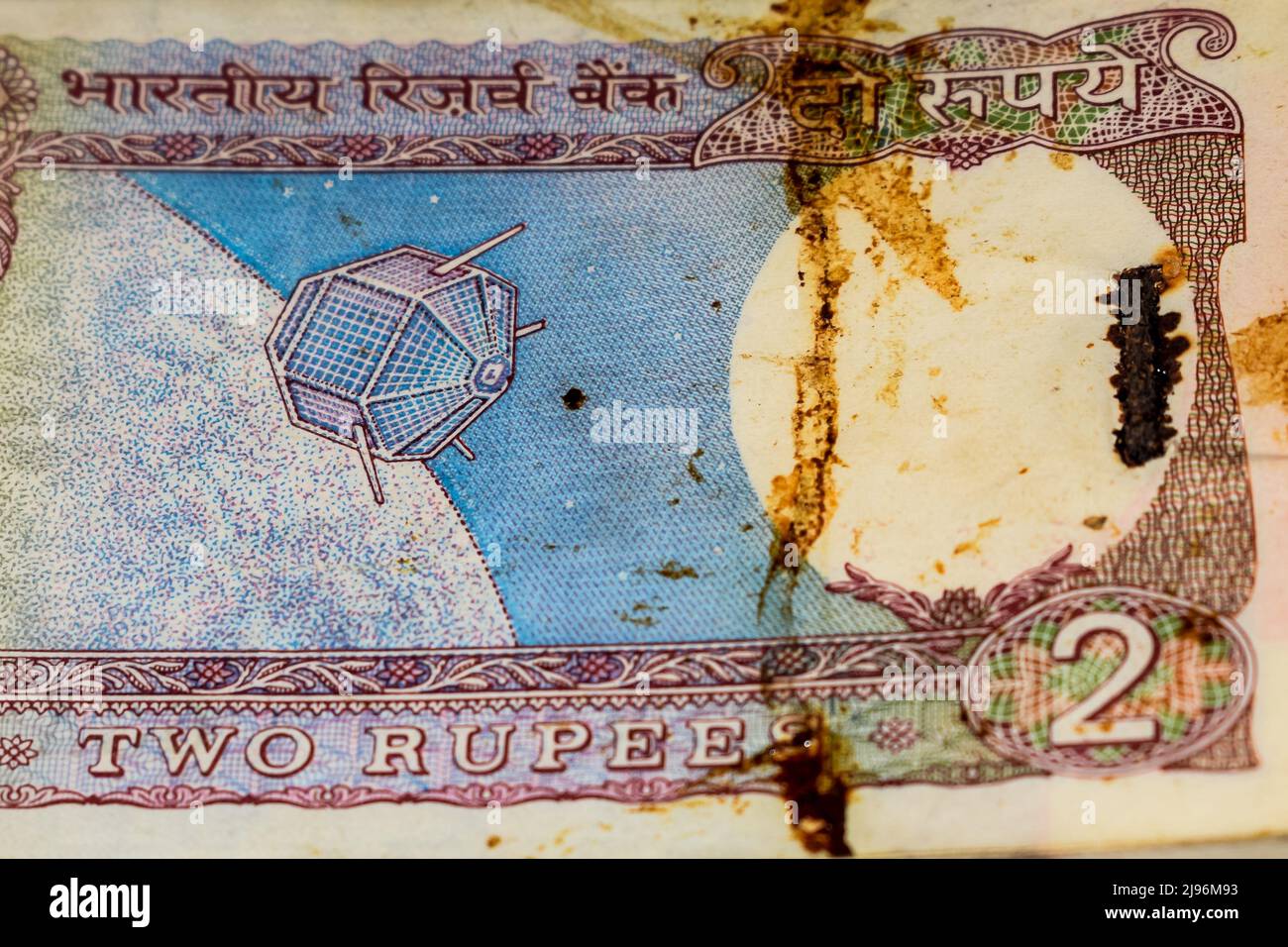 Old Two Rupee notes combined on the table, India money on the rotating ...
