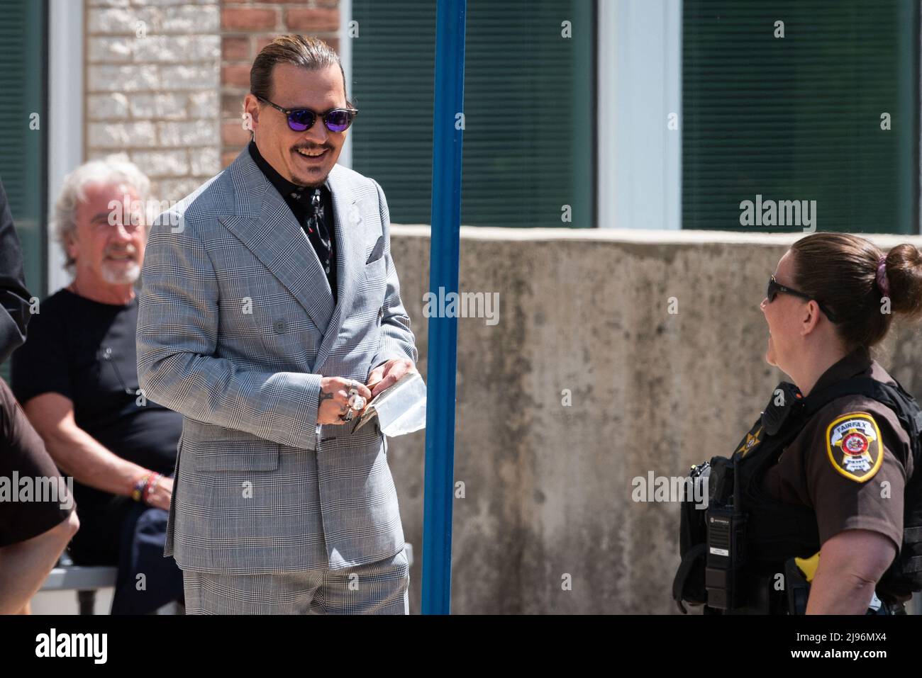 Johnny Depp takes a break at the Fairfax County Courthouse, in Fairfax ...