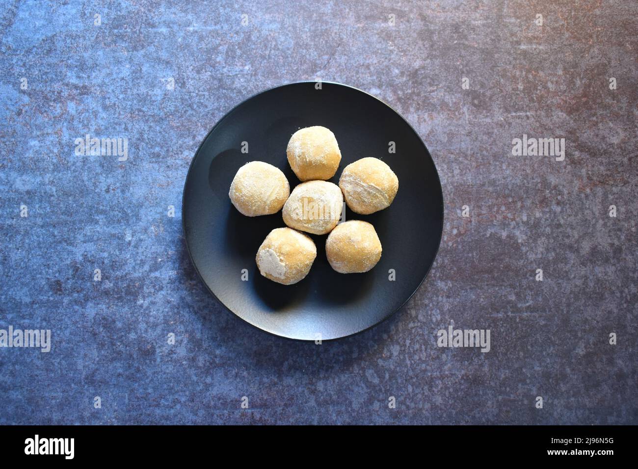 Besan laddu Indian traditional dessert made from gram flour Stock Photo ...