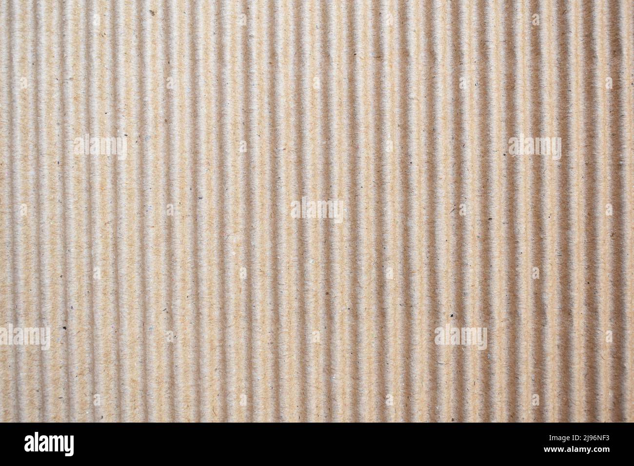 Brown color corrugated cardboard box textured background with vertical ...