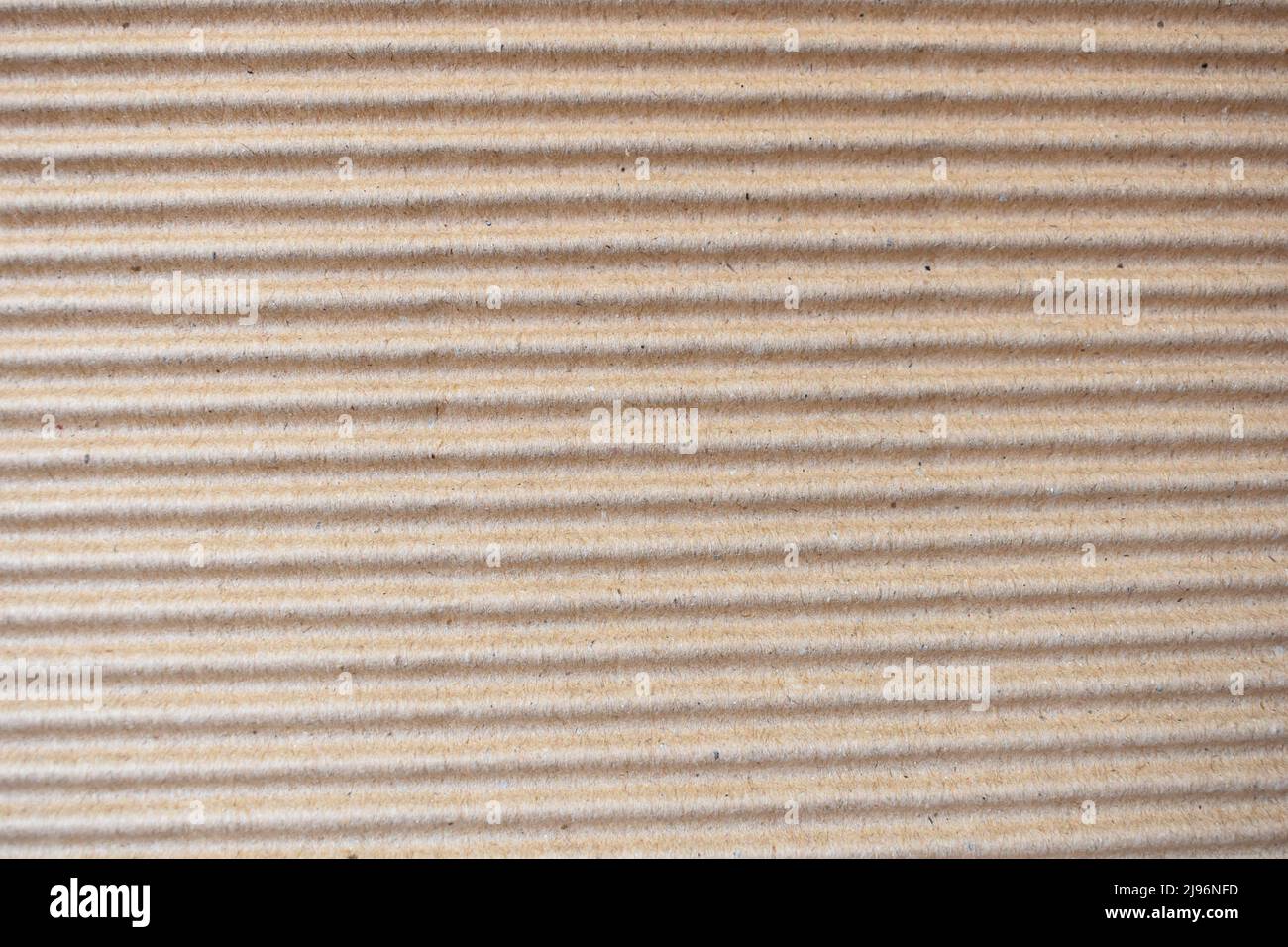 Brown color corrugated cardboard box textured background with ...