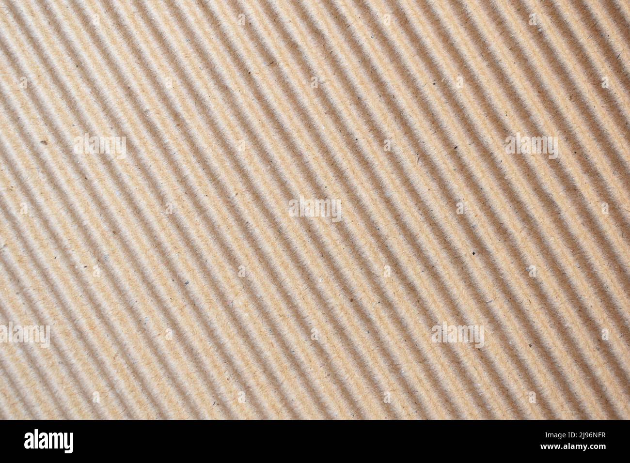 Brown color corrugated cardboard textured background with diagonal ...