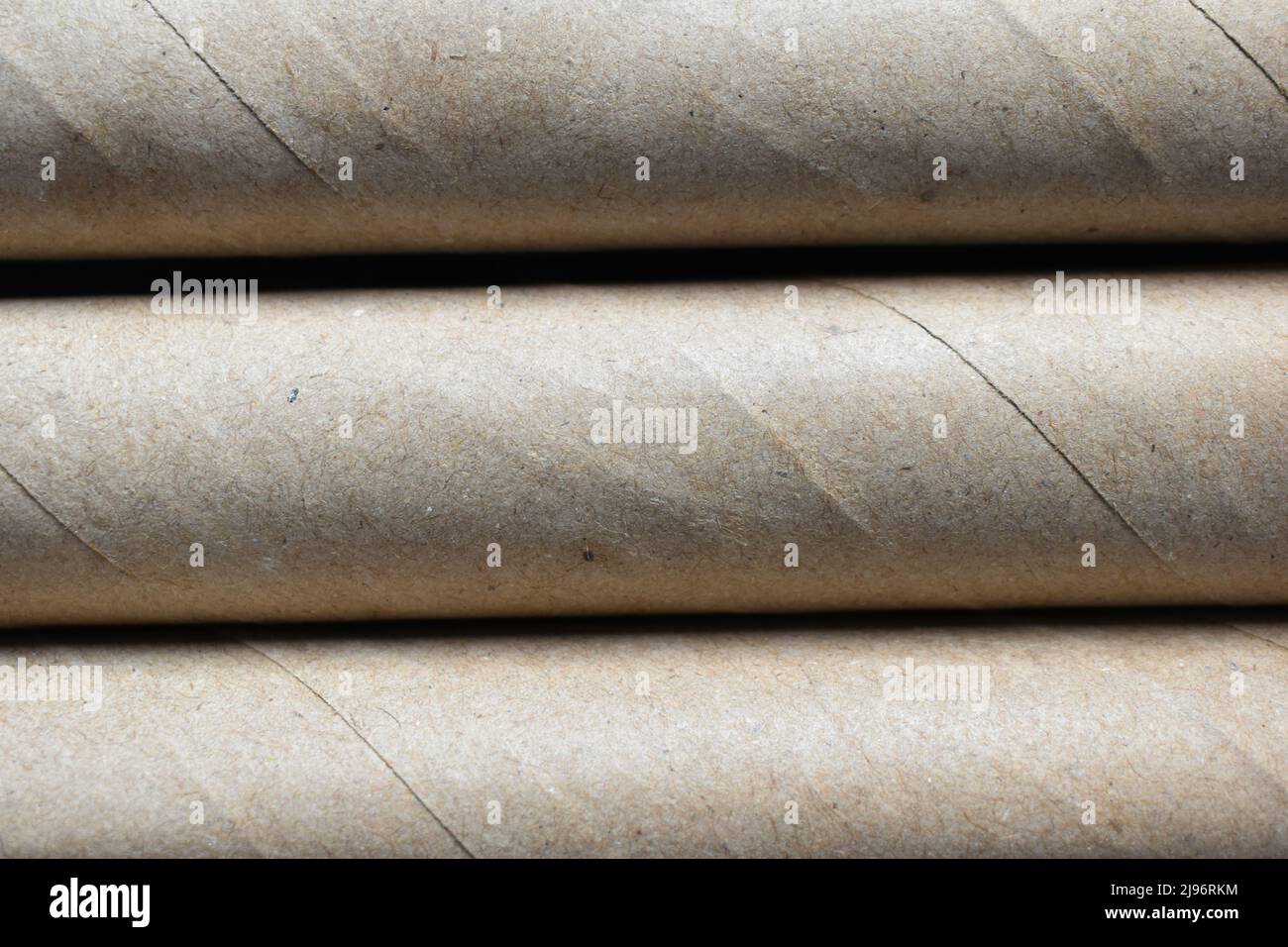 Close up of cylindrical cardboard packaging tube Stock Photo - Alamy
