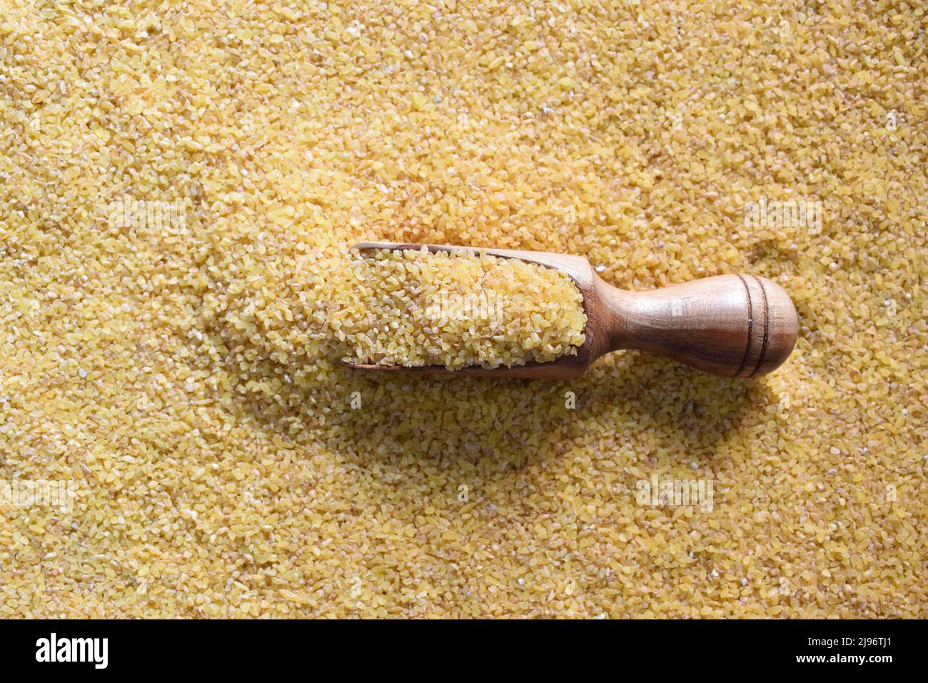 Raw dried broken wheat cereal grains Stock Photo - Alamy