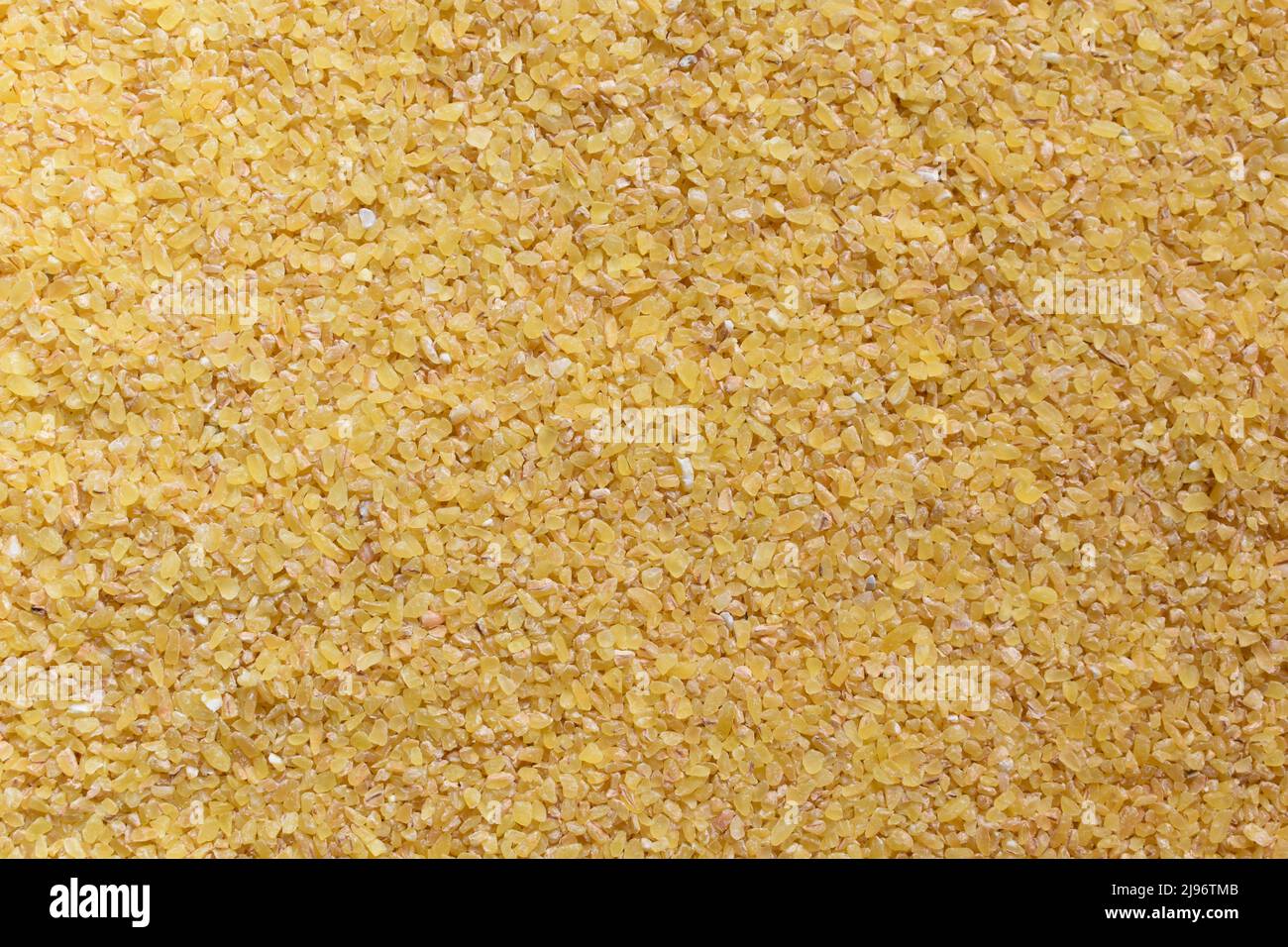 Raw dried broken wheat cereal grains Stock Photo - Alamy