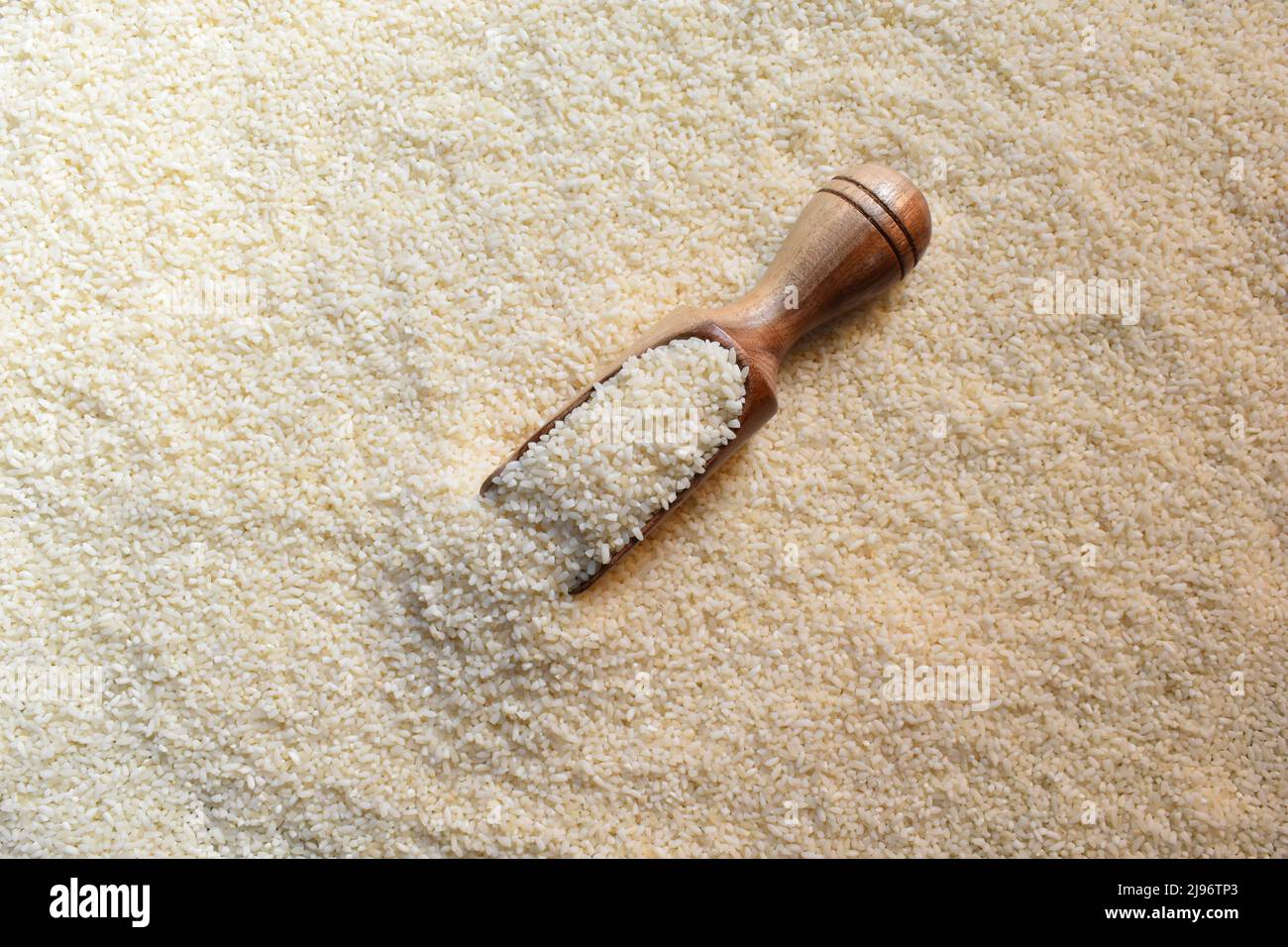 White color raw dried broken rice Stock Photo - Alamy