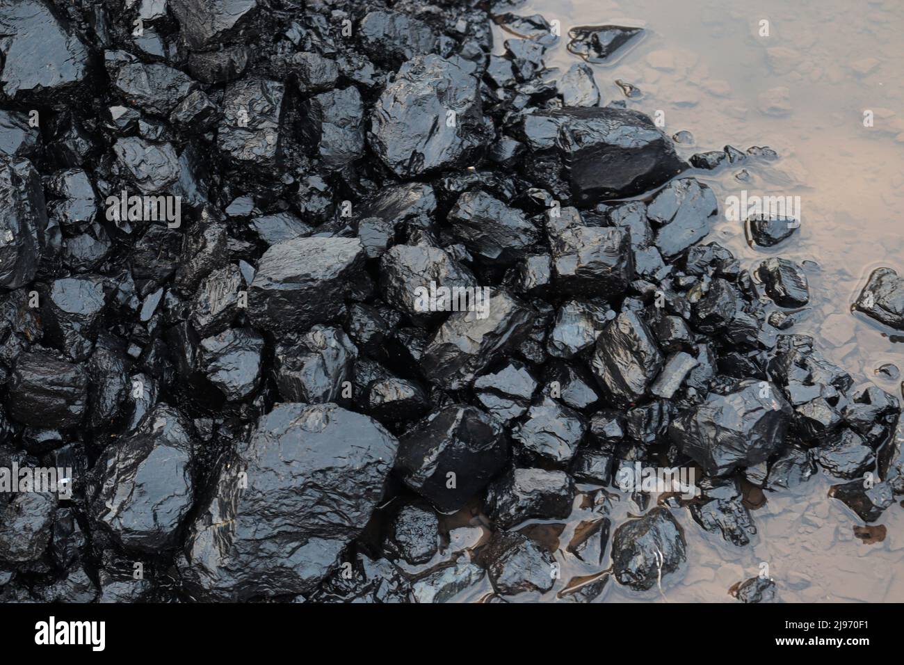 black colored coal stock on digging for sell Stock Photo - Alamy