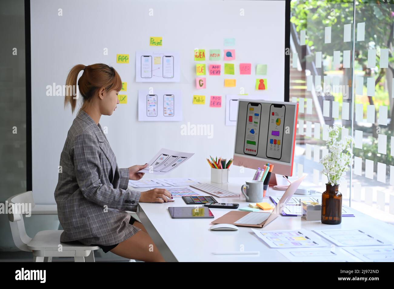 Female web designer hi-res stock photography and images - Alamy