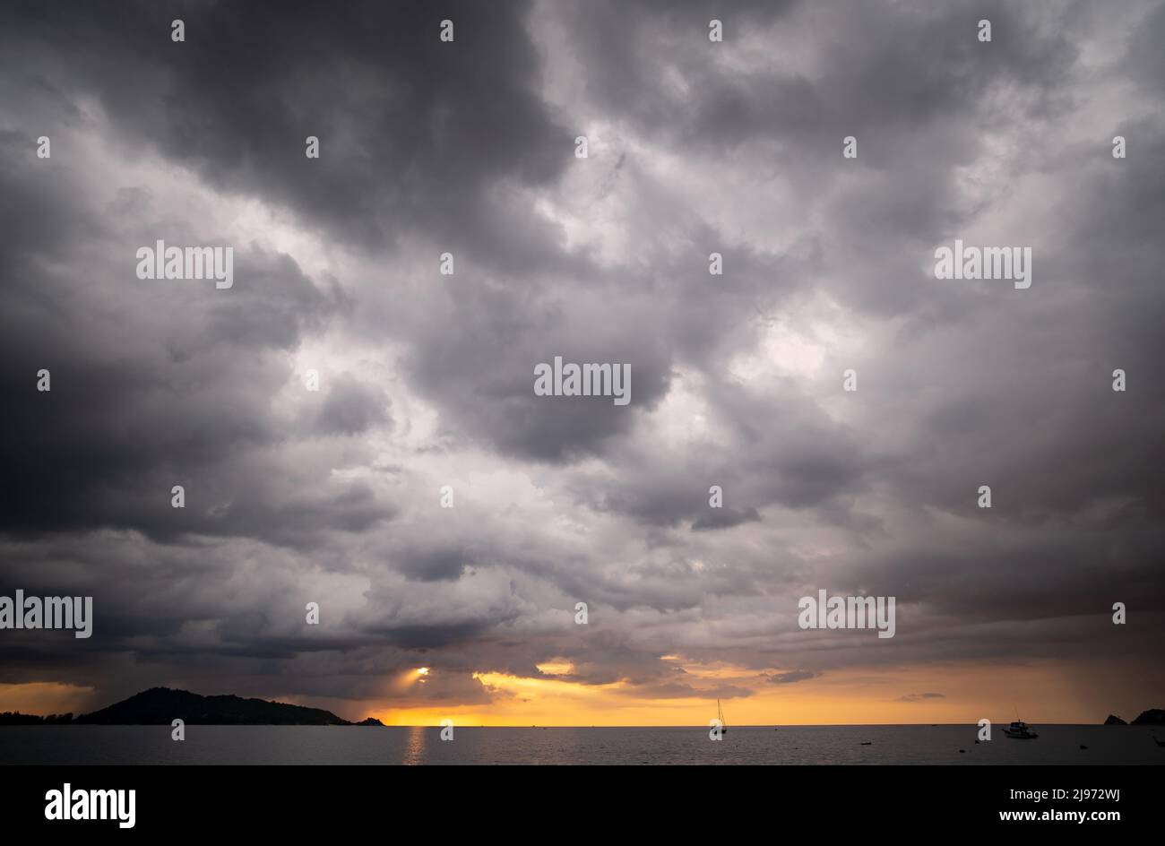 Dark raining clouds over sea in bad weather day Stock Photo - Alamy