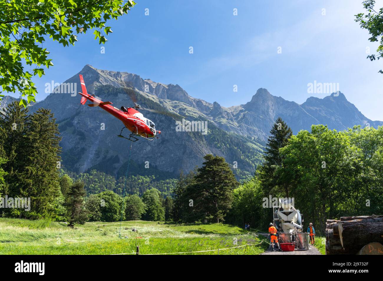 Maienfeld, Switzerland - 20 May, 2022: helicopter preparing to carry a ...