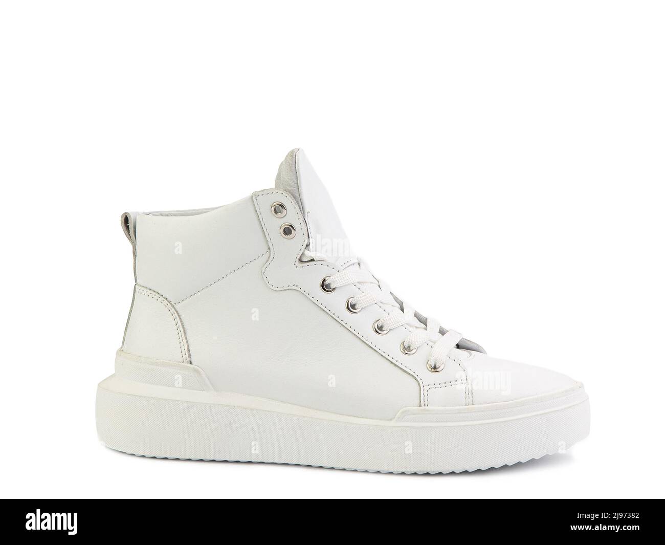 White classic leather trainers. Casual women's style. White lacing and ...