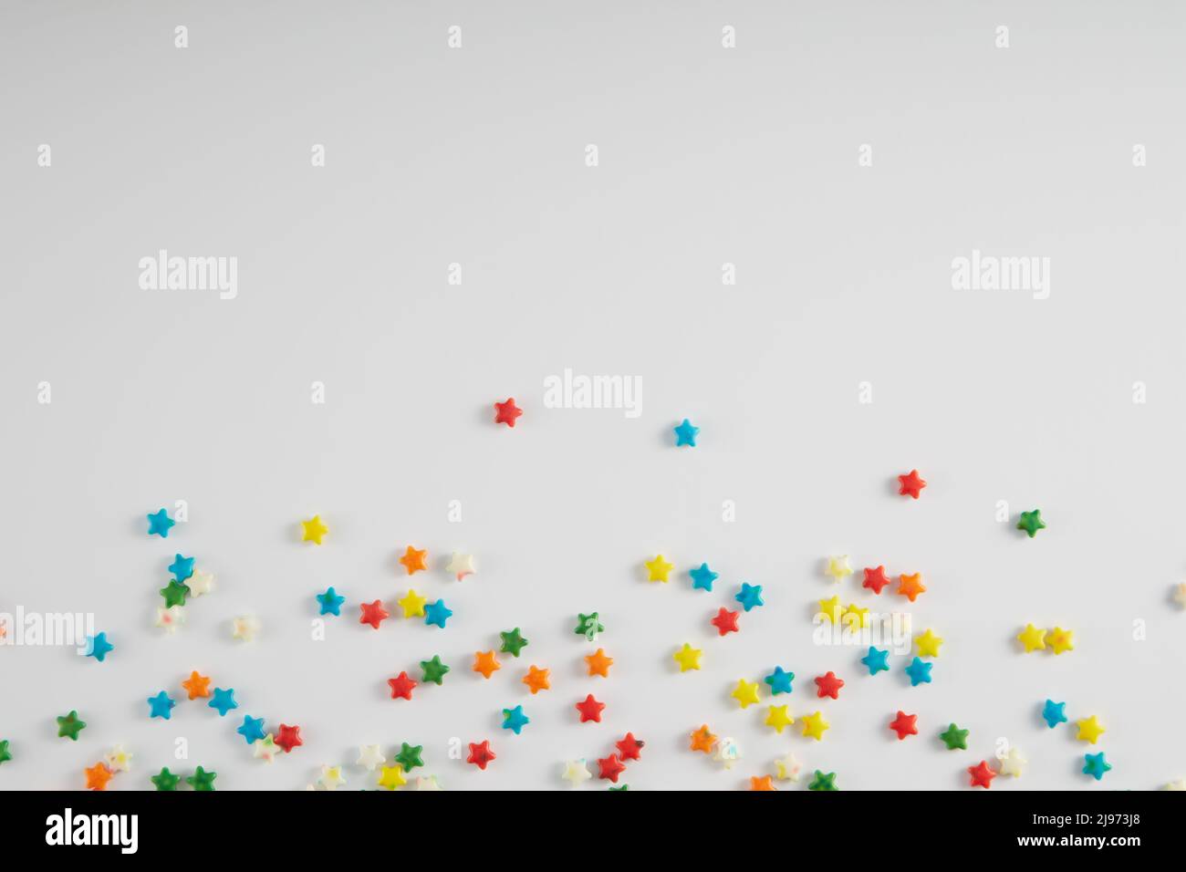 Bunch of colorful stars on white background Stock Photo - Alamy