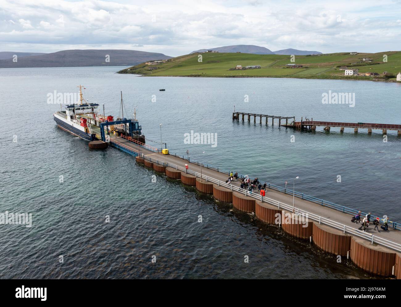 MV Hoy Head ferry from Hoy disembarking at Houton Pier, Orkney Mainland ...
