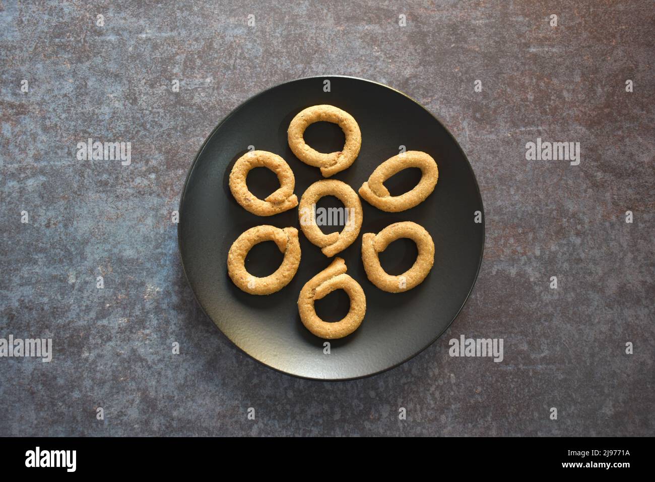 Kodubale Indian traditional savory snack Stock Photo - Alamy