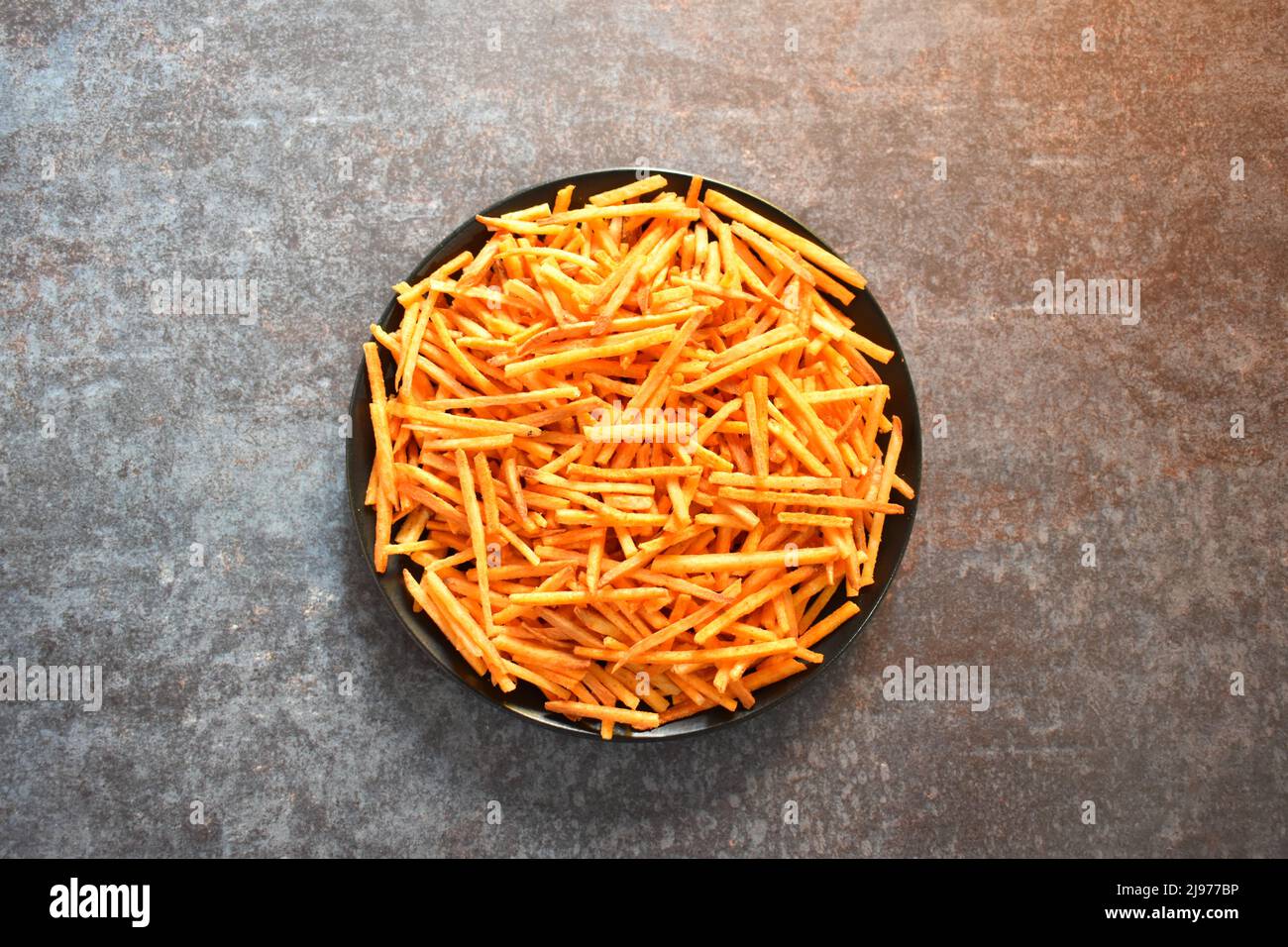 Deep fried Tapioca chips snack food Stock Photo - Alamy