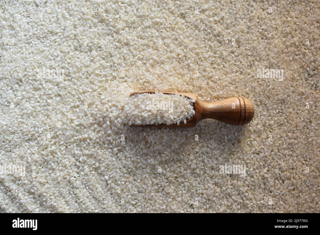 Raw whole dried Idli parboiled rice Stock Photo - Alamy