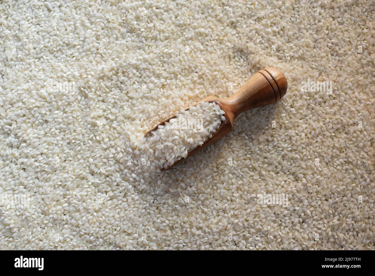 Raw whole dried Idli parboiled rice Stock Photo - Alamy