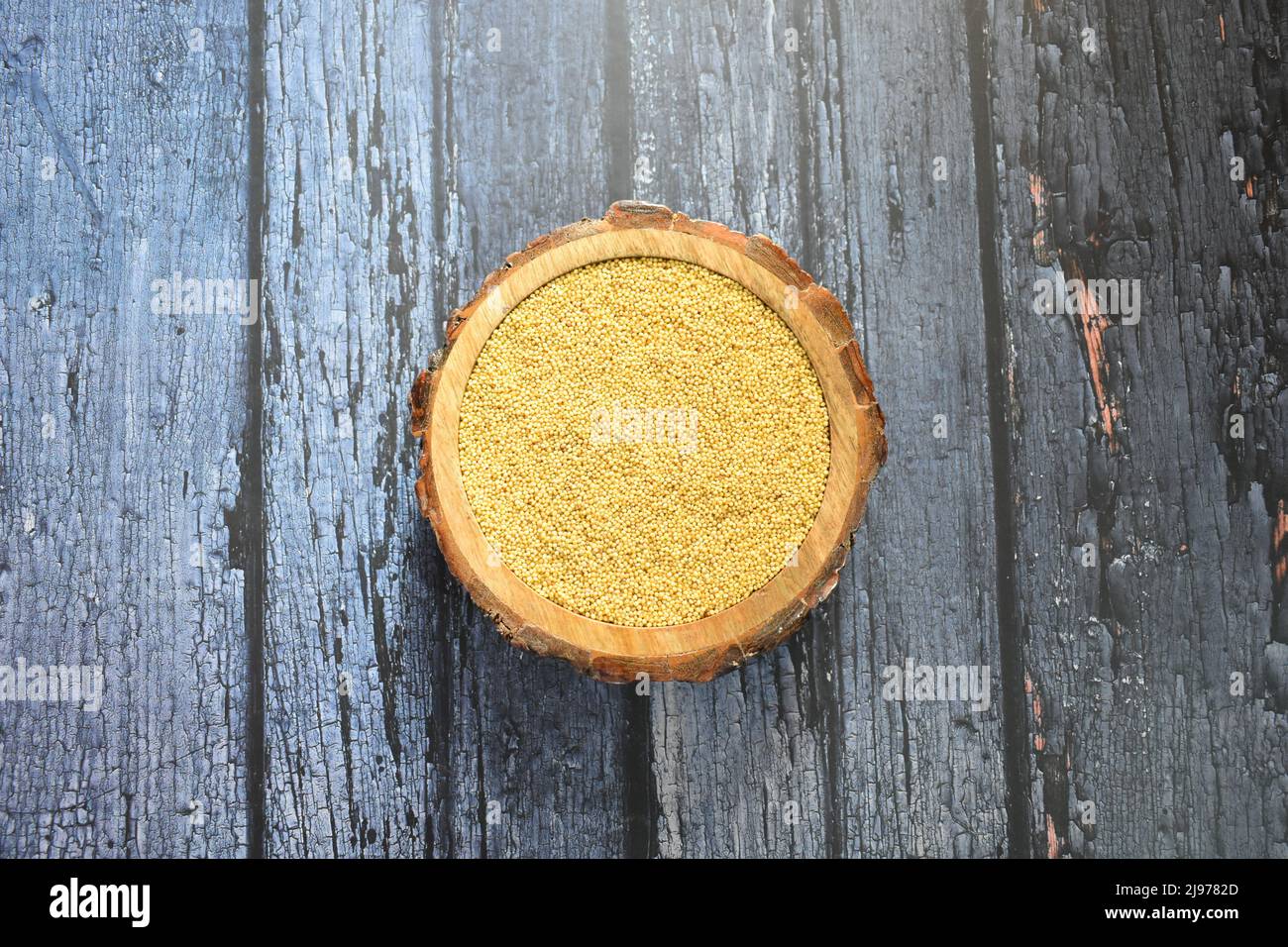 Raw whole dried Foxtail millet Stock Photo - Alamy