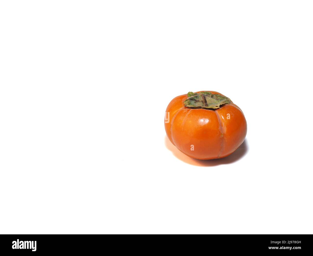 Ripe persimmon on a white background. Chocolate persimmon Stock Photo ...