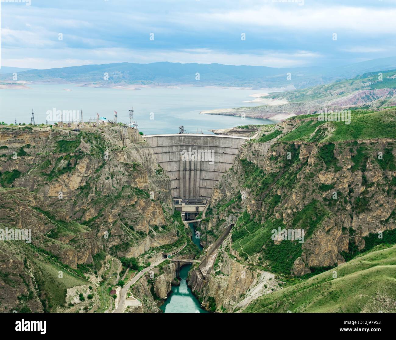 large arch dam of a hydroelectric power station on a river in a ...
