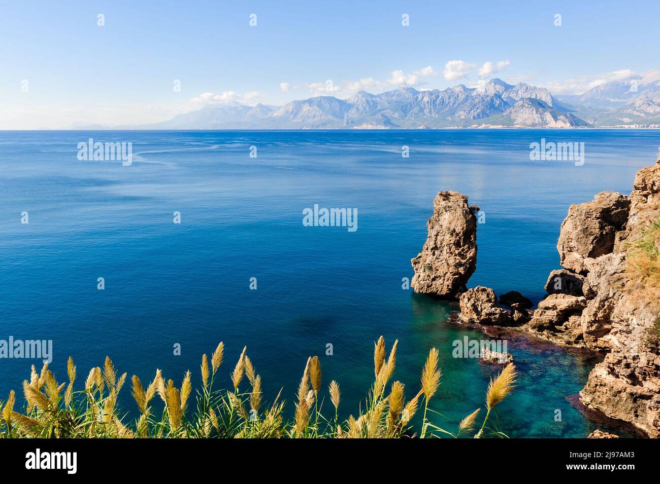 A cliffy coastal scenery of Antalya, Turkey in winter time with snowy ...