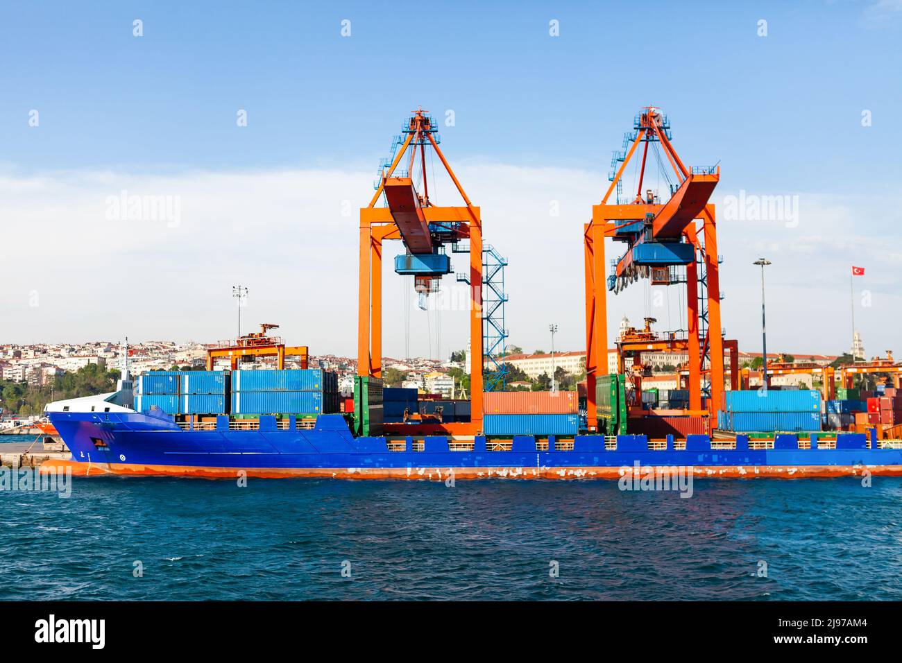 Big container ship docked at Haydarpaşa Port. Containers are unloaded ...
