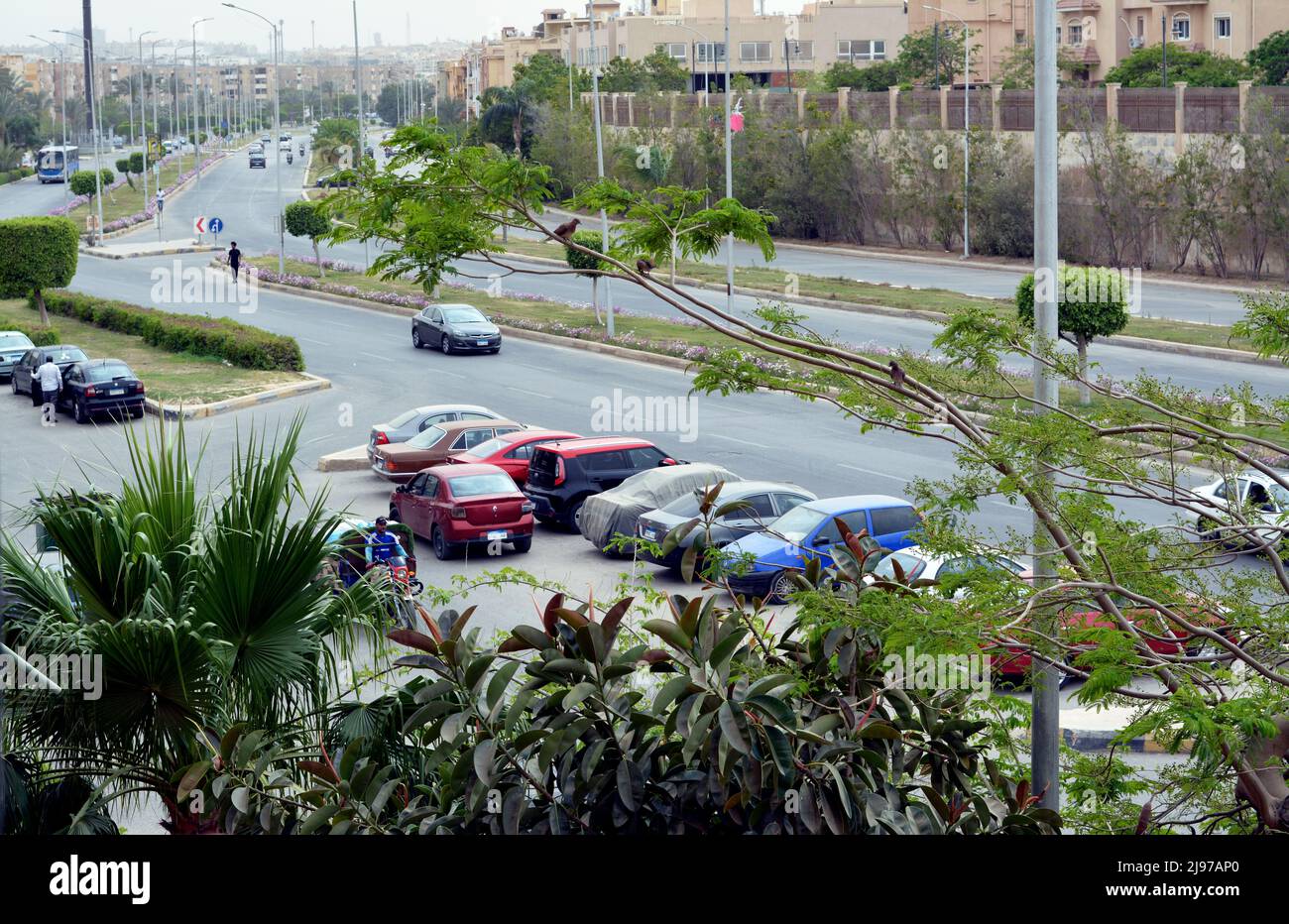Giza, Egypt, May 13 2022: the moving vehicles and cars on the streets ...