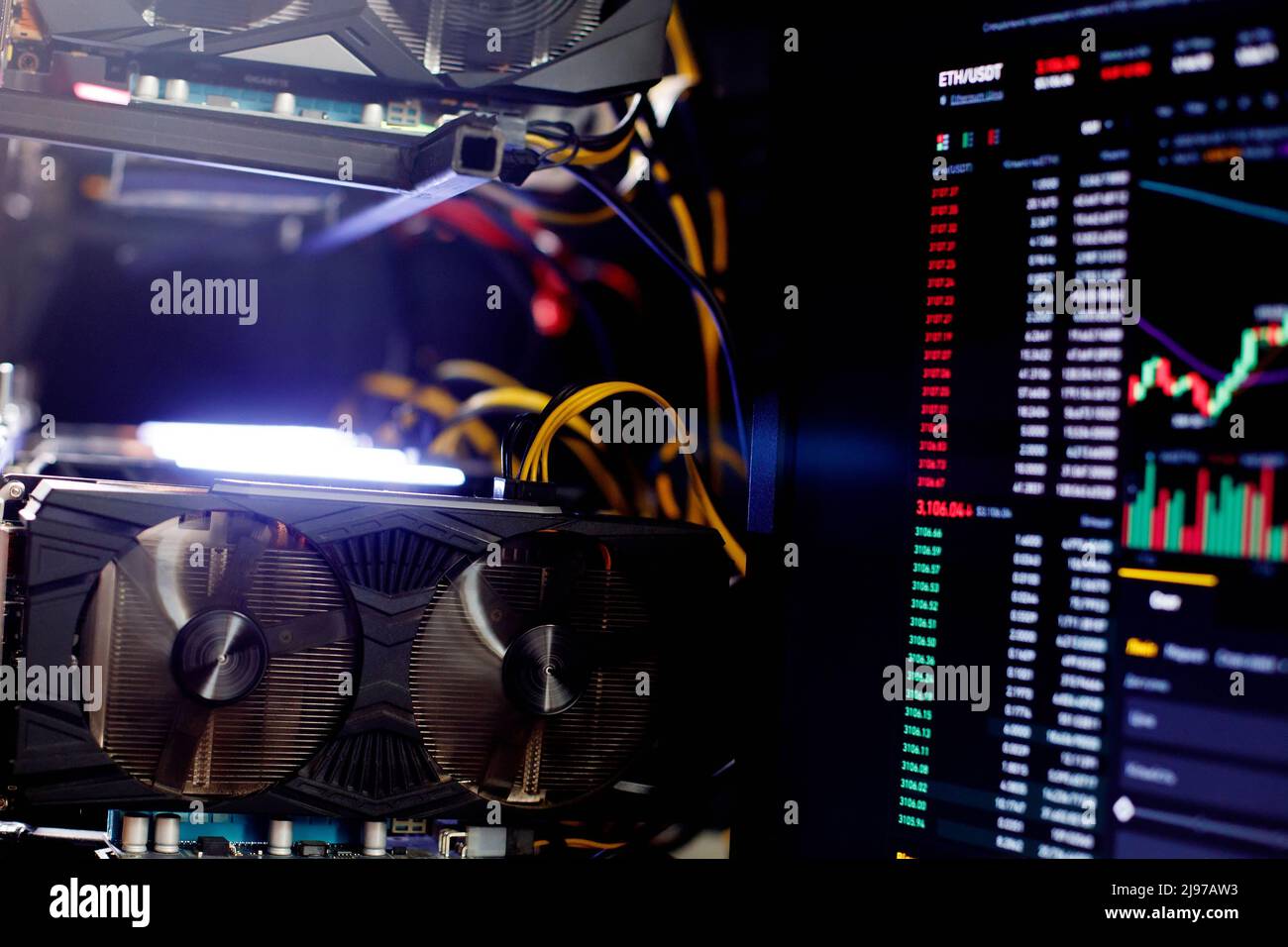 Graphics cards in rig for ethereum mining farm on background Stock ...
