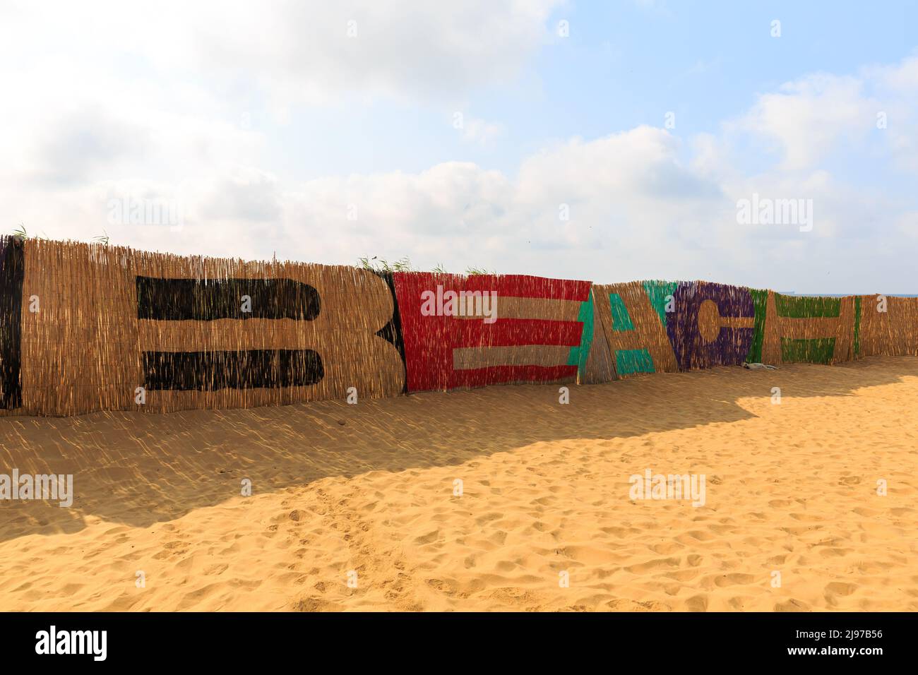 Beach Sign, sands and sky together Stock Photo - Alamy