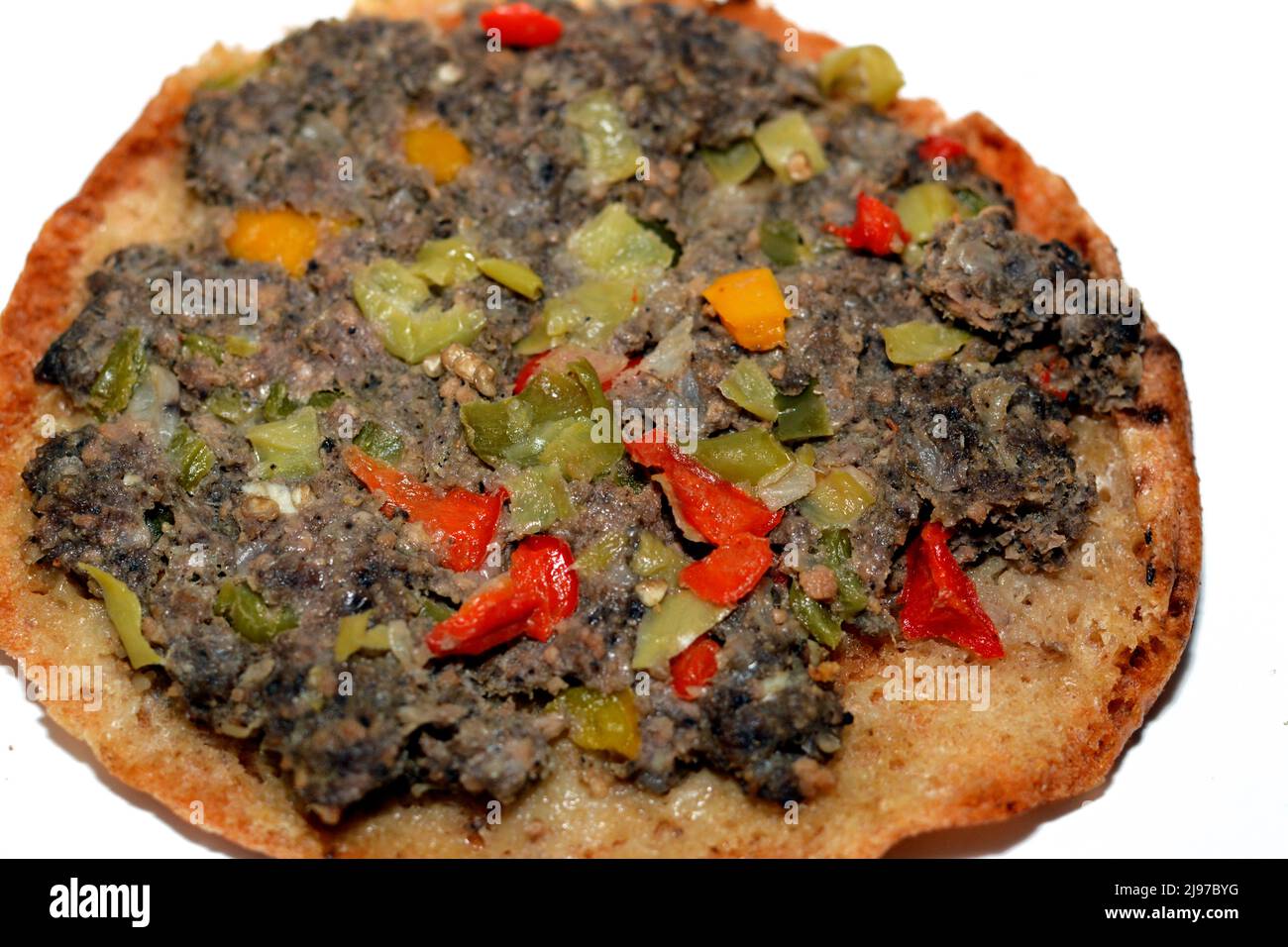 Traditional Egyptian dish Hawawshi, pita stuffed with minced meat and ...