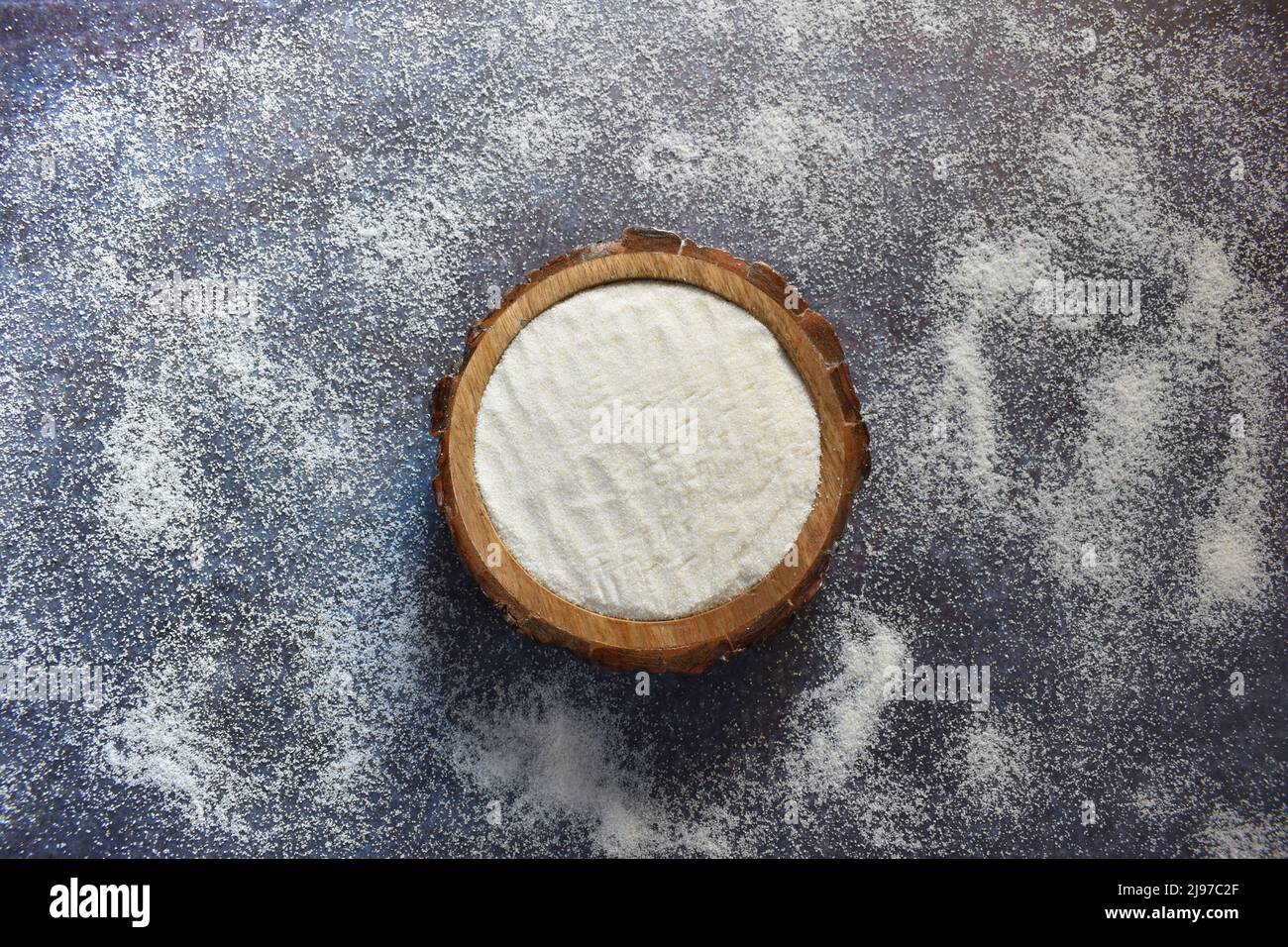 Raw coarse dried rice semolina Stock Photo - Alamy