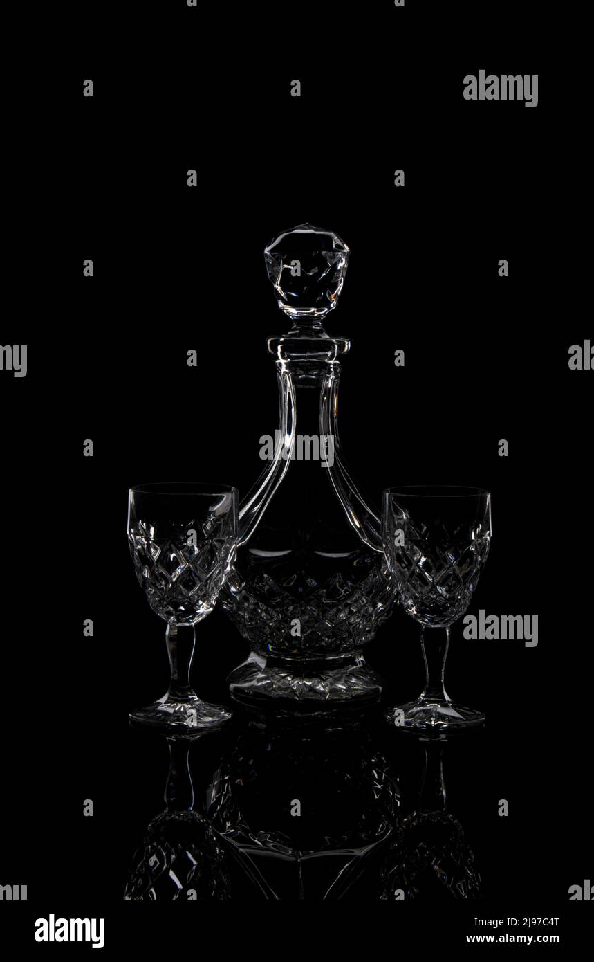 Dark Field - Decanter & Glasses Black Background Stock Photo - Alamy