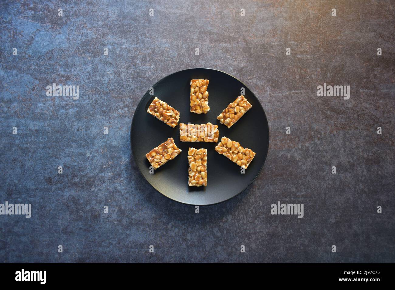 Chikki Indian traditional brittle sweet made from peanuts and jaggery ...