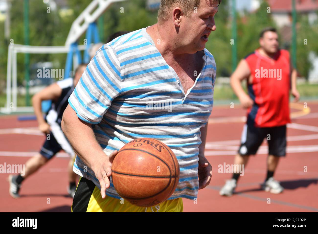 Orenburg, Russia - July 30, 2017 year: men play Street Basketball in ...