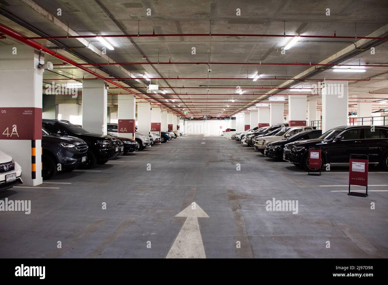Thai people and travelers guest drive vehicle stop in parking car ...
