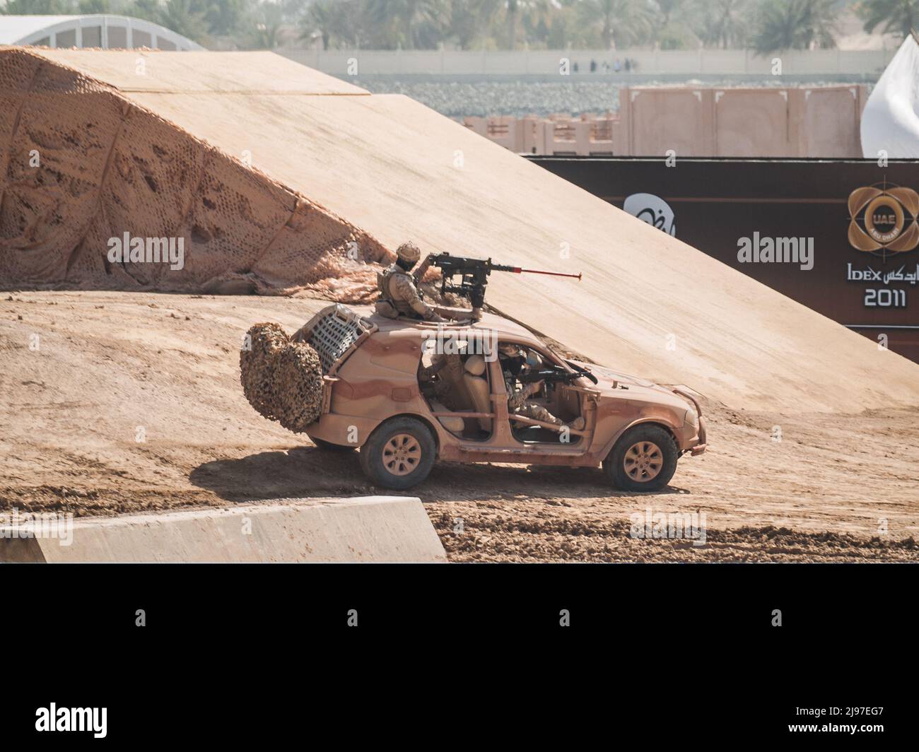 Abu Dhabi, UAE - Feb.23. 2011: UAE Armed forces BMW X3 and ATV (All ...