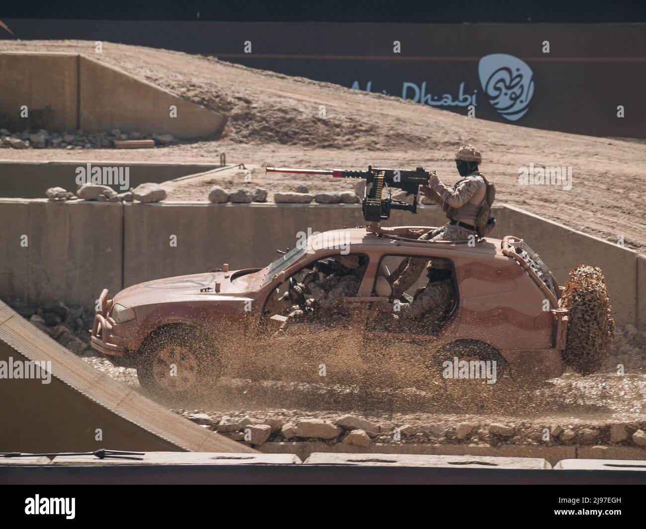 Abu Dhabi, UAE - Feb.23. 2011: UAE Armed forces BMW X3 and ATV (All ...