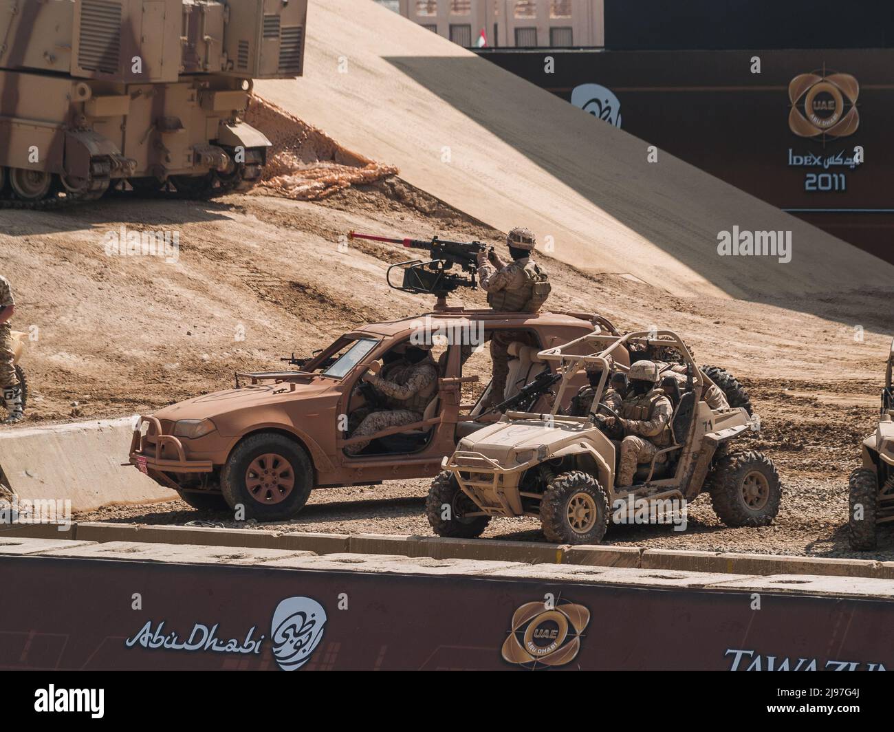 Abu Dhabi, UAE - Feb.23. 2011: UAE Armed forces BMW X3 and ATV (All ...