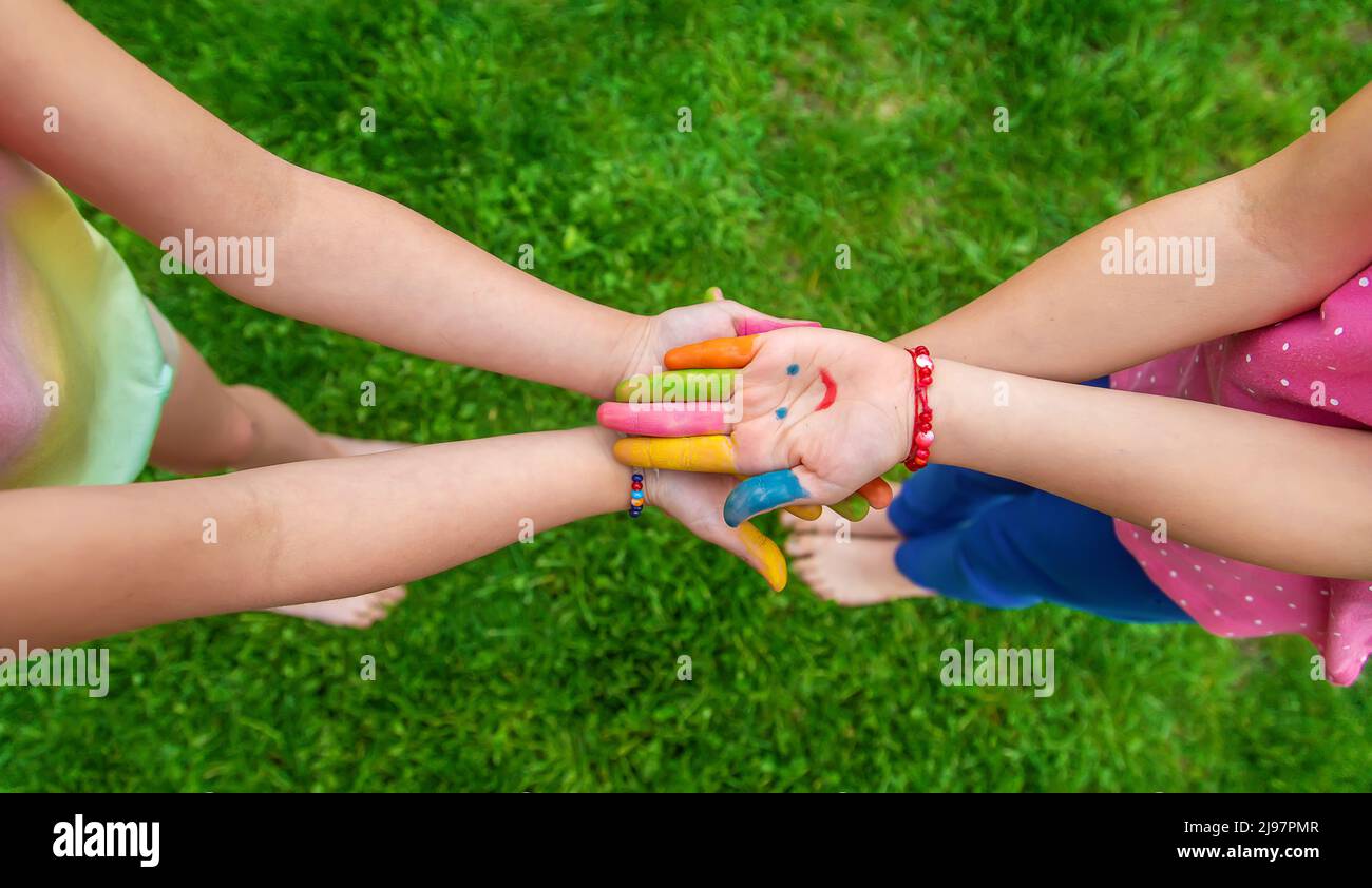 Hands of a child with a drawn smile. Selective focus Stock Photo - Alamy