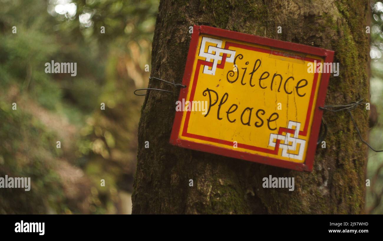 A sign reading Silence Please at a meditation center in India Stock ...