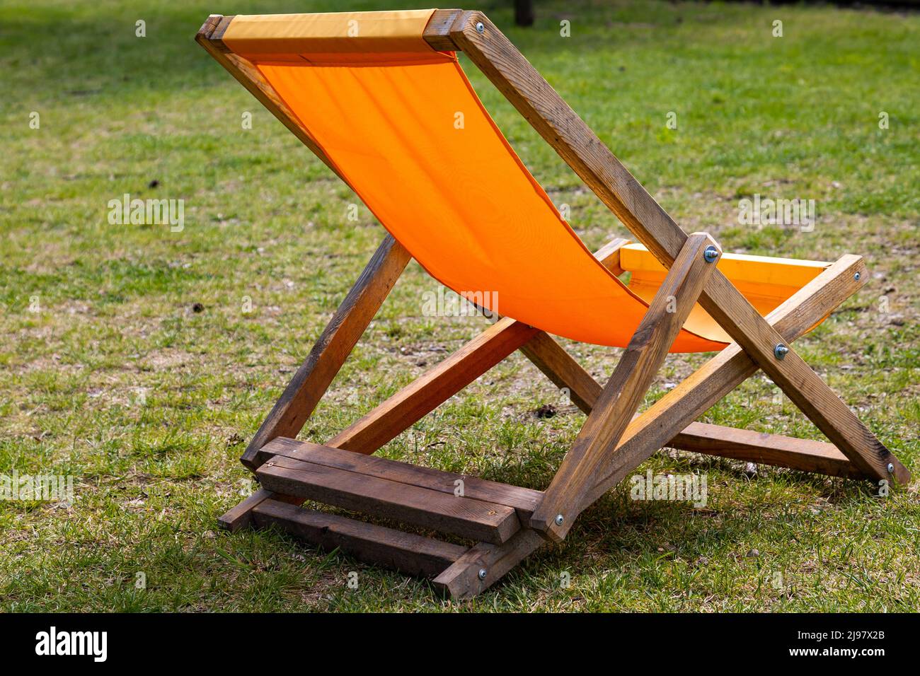 Foldable, colorful garden chairs on the relaxation site. Photo taken on ...