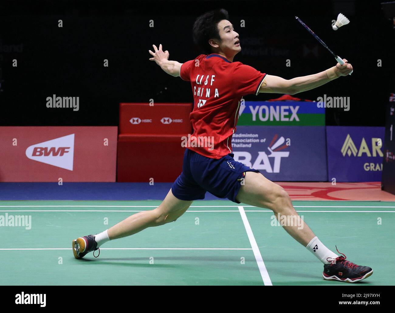 Bangkok, Thailand. 21st May, 2022. Li Shifeng of China hits a return ...