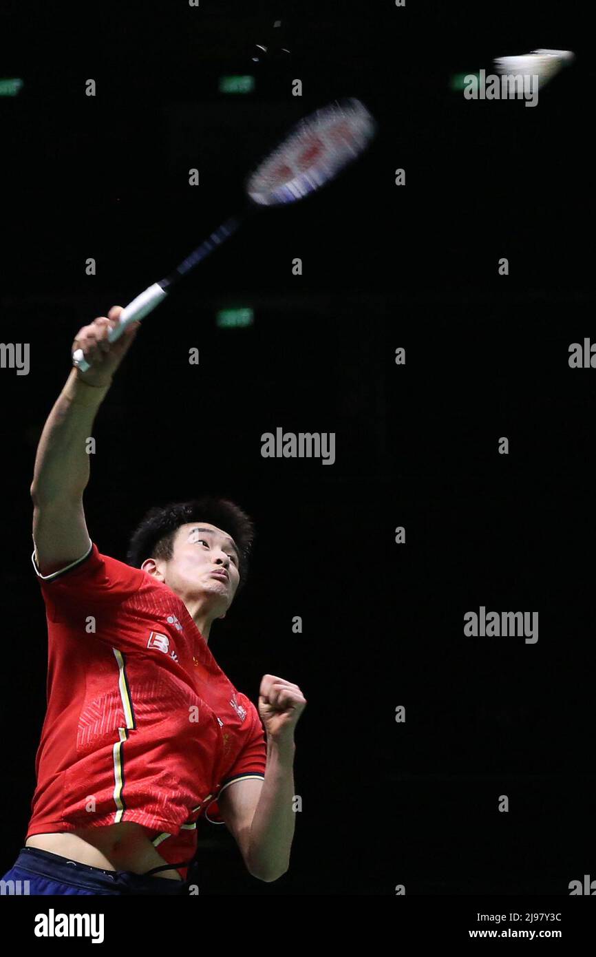 Bangkok, Thailand. 21st May, 2022. Li Shifeng of China hits a return ...